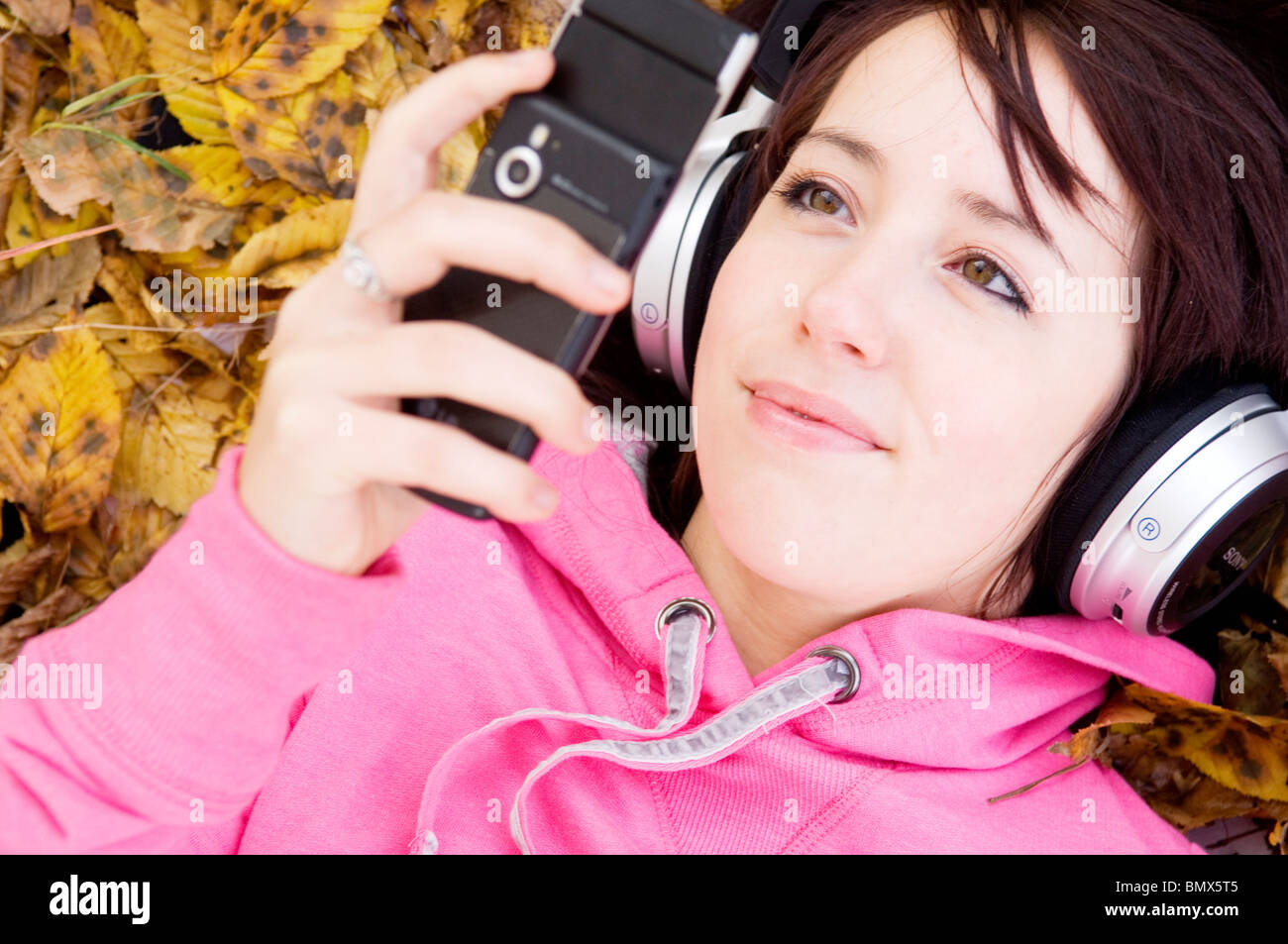 teenager listening to music Stock Photo - Alamy