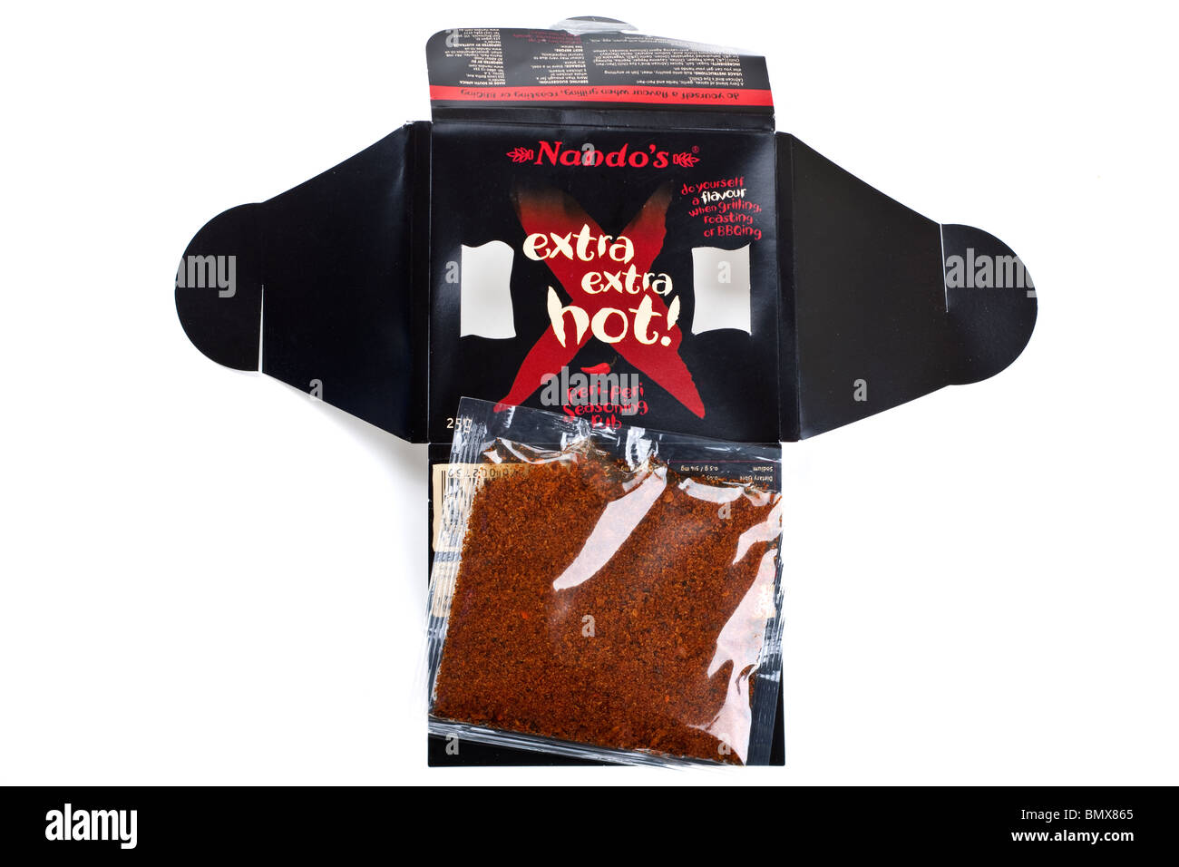 Open packet of Nandos extra extra hot peri peri grilling and roasting ...