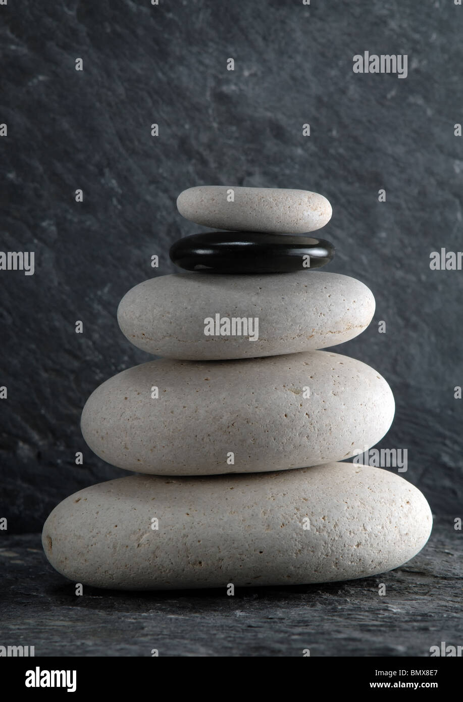 white and black zen stones in a balance Stock Photo - Alamy