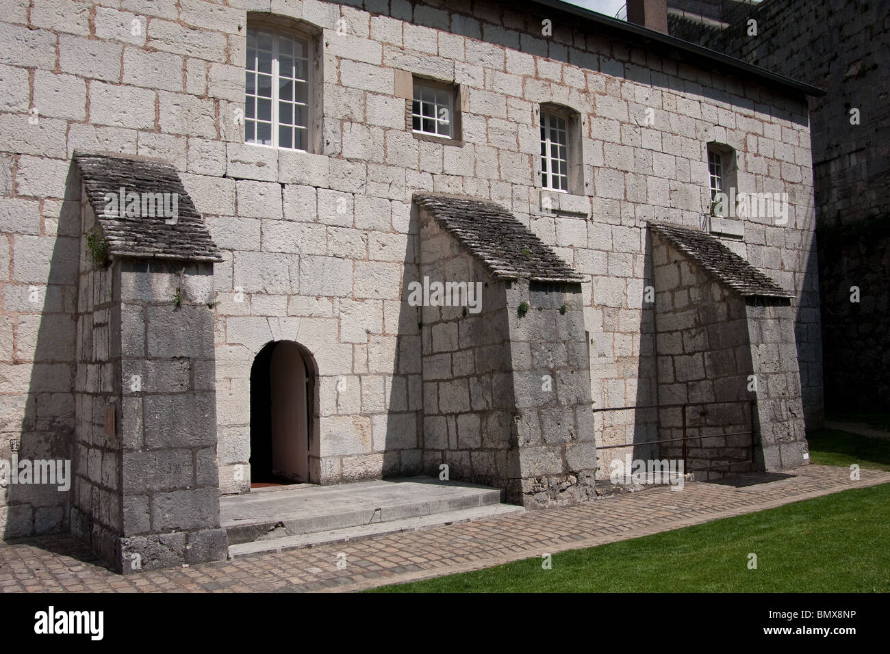 chateau front facade buttress stone glass windows Stock Photo - Alamy