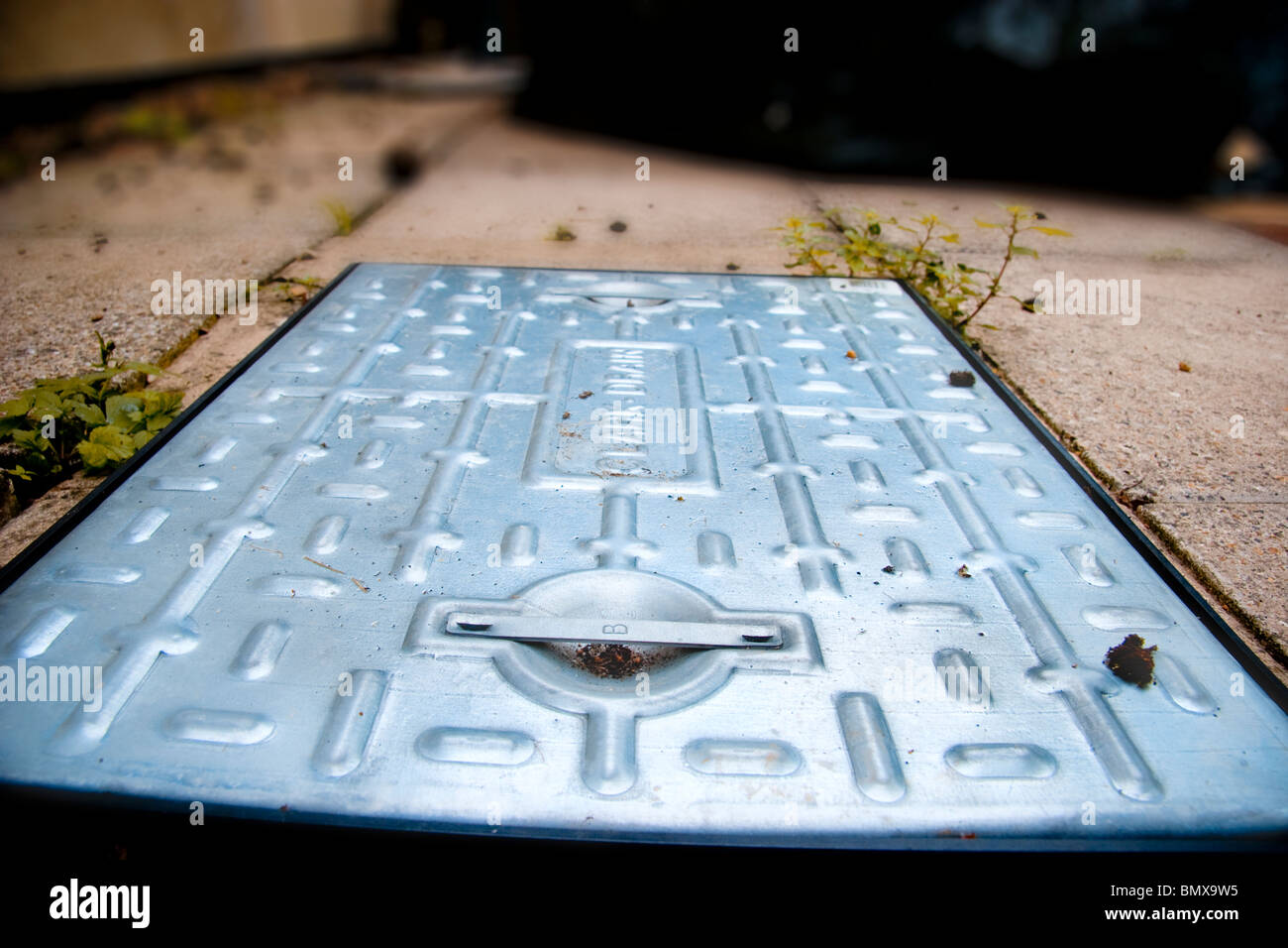 Drainage inspection hole cover Stock Photo - Alamy
