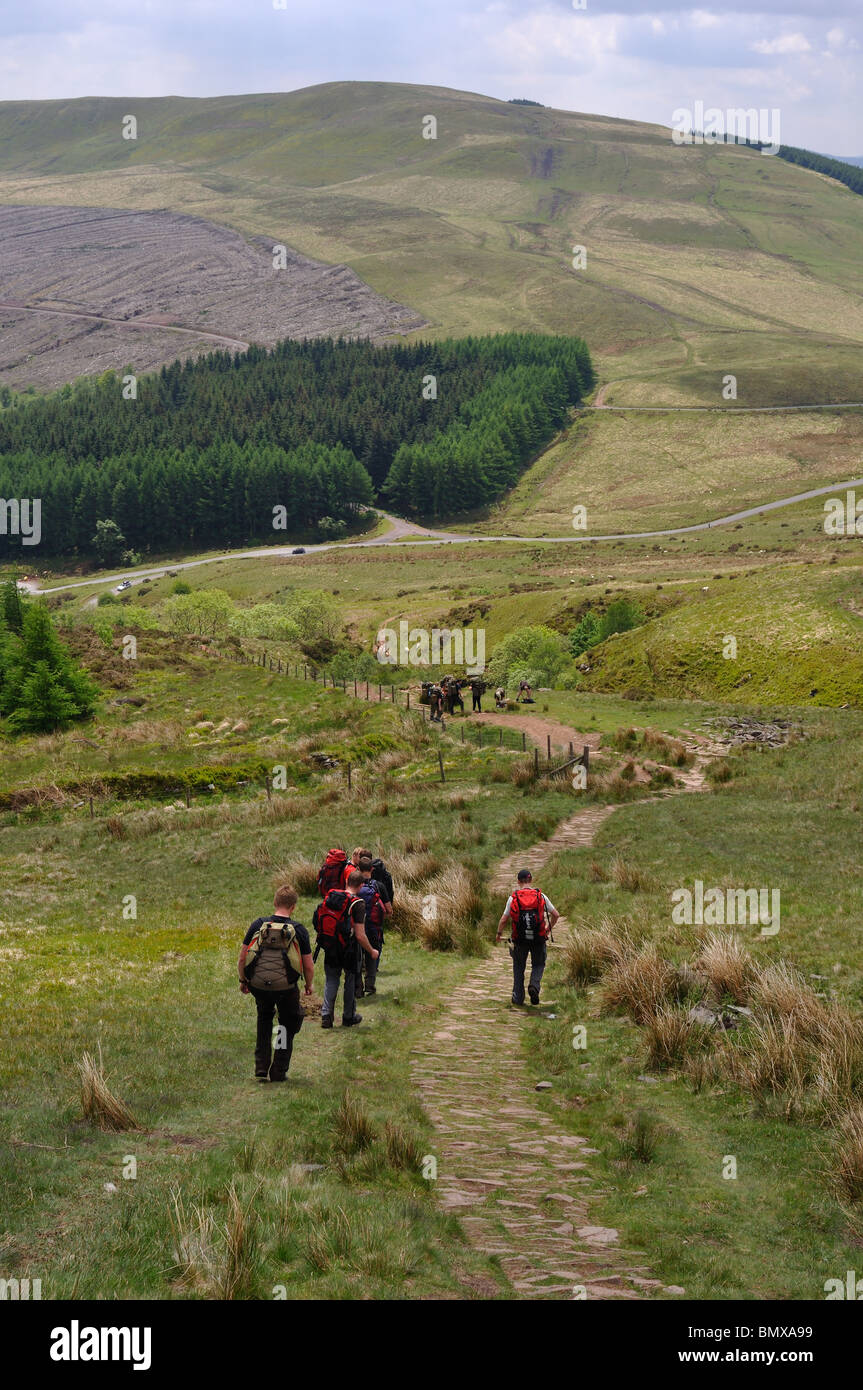 Walkers descend Torpantau towards Talybont in the Brecon Beacons South ...