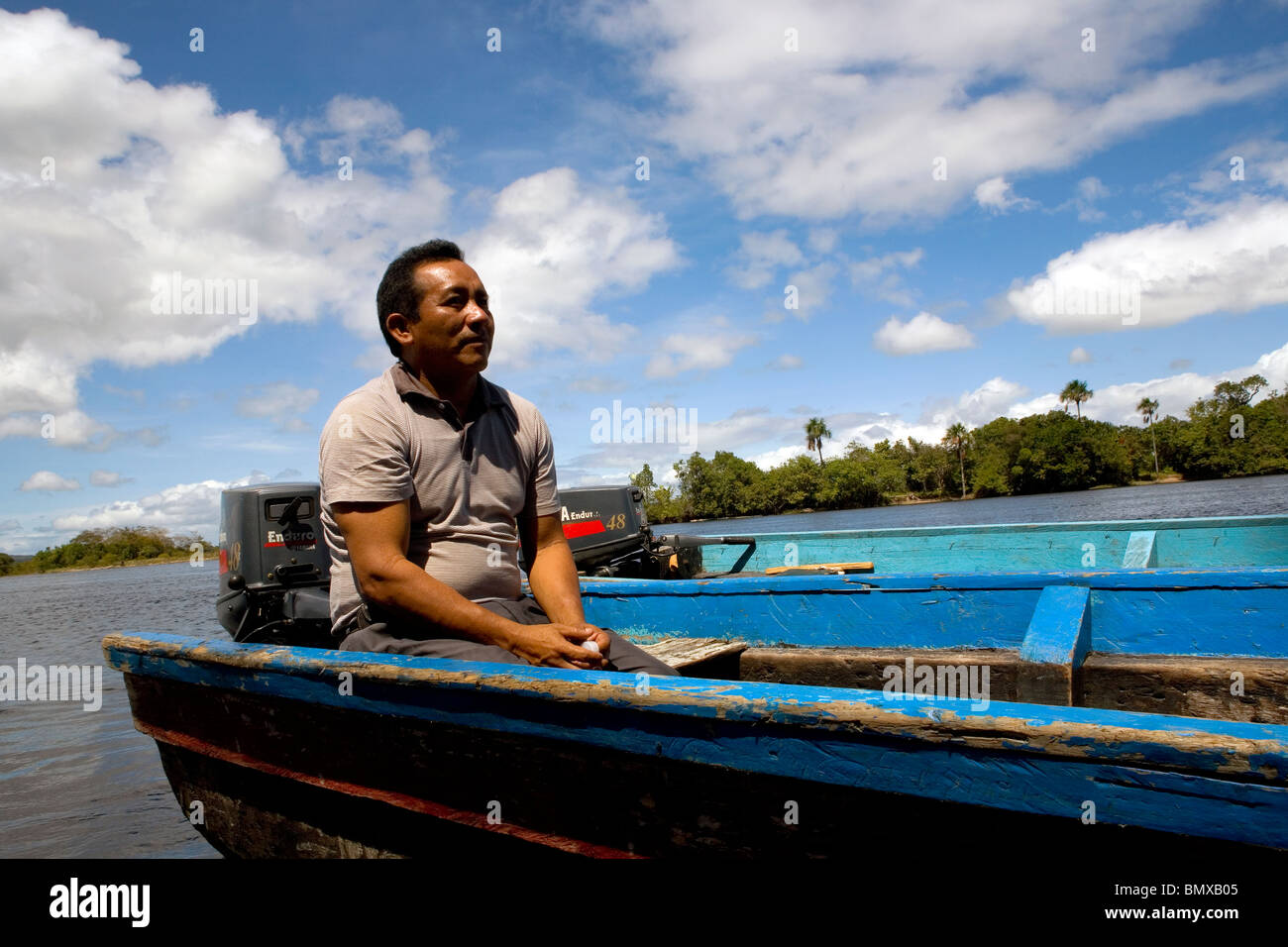 A Pemon Tribe Indigenous Man On His Boat At Canaimas River Complex ...
