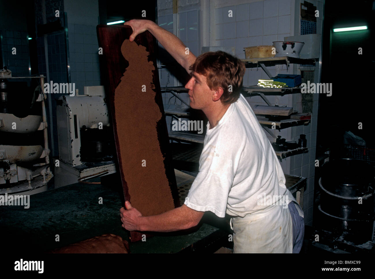 Belgian man, employee, worker, working, baker, baking biscuits ...