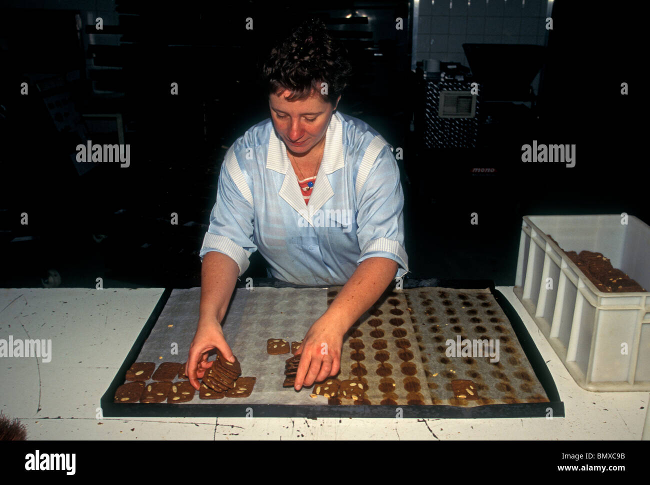 Belgian woman, employee, worker, working, baker, baking biscuits ...