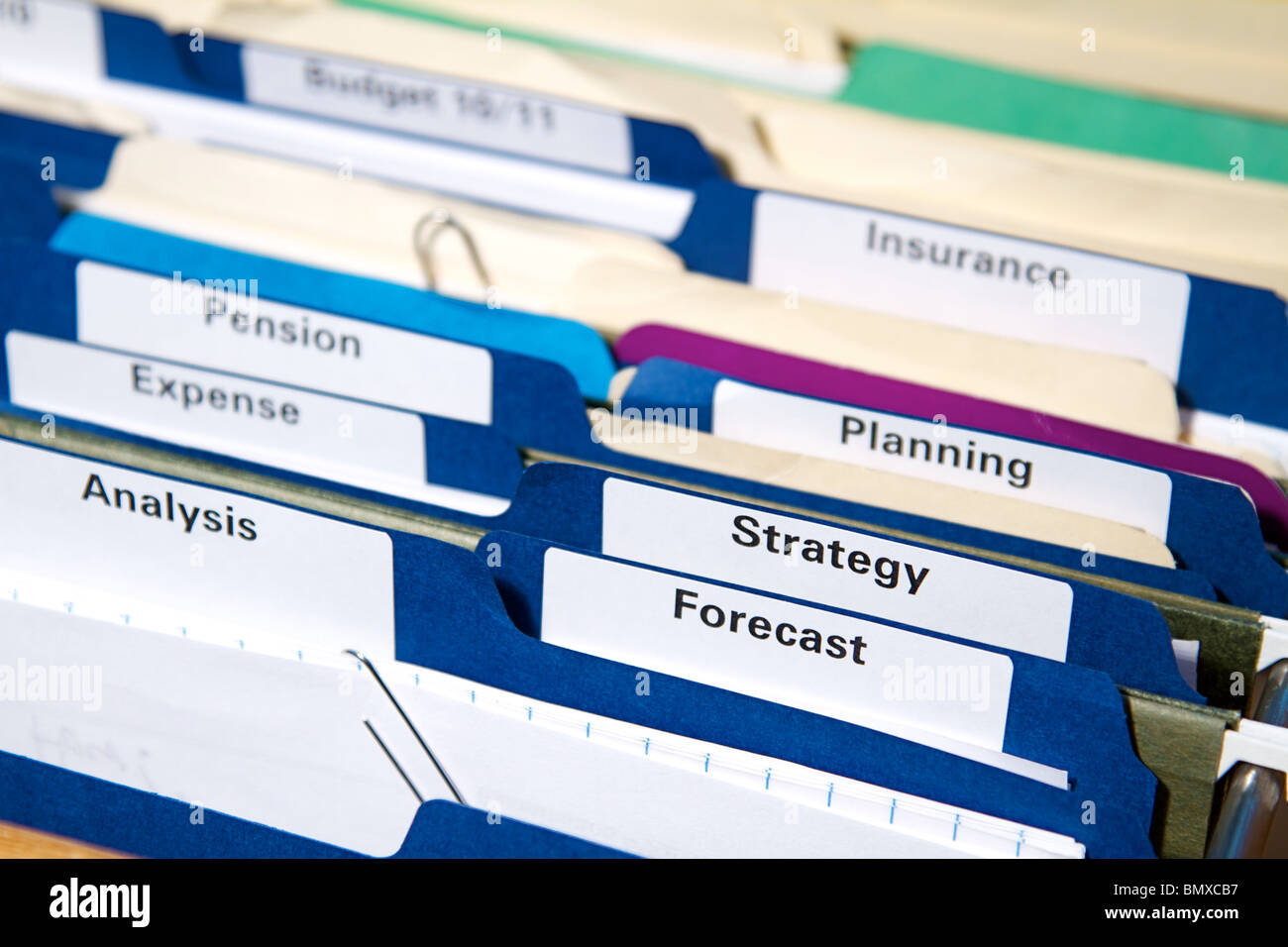 Filing cabinet full of business folders and documents Stock Photo - Alamy
