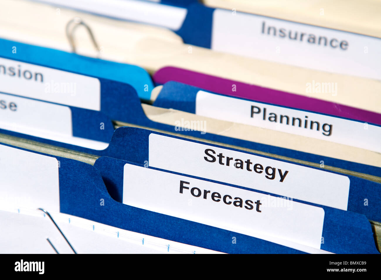 Filing cabinet full of business folders and documents Stock Photo - Alamy