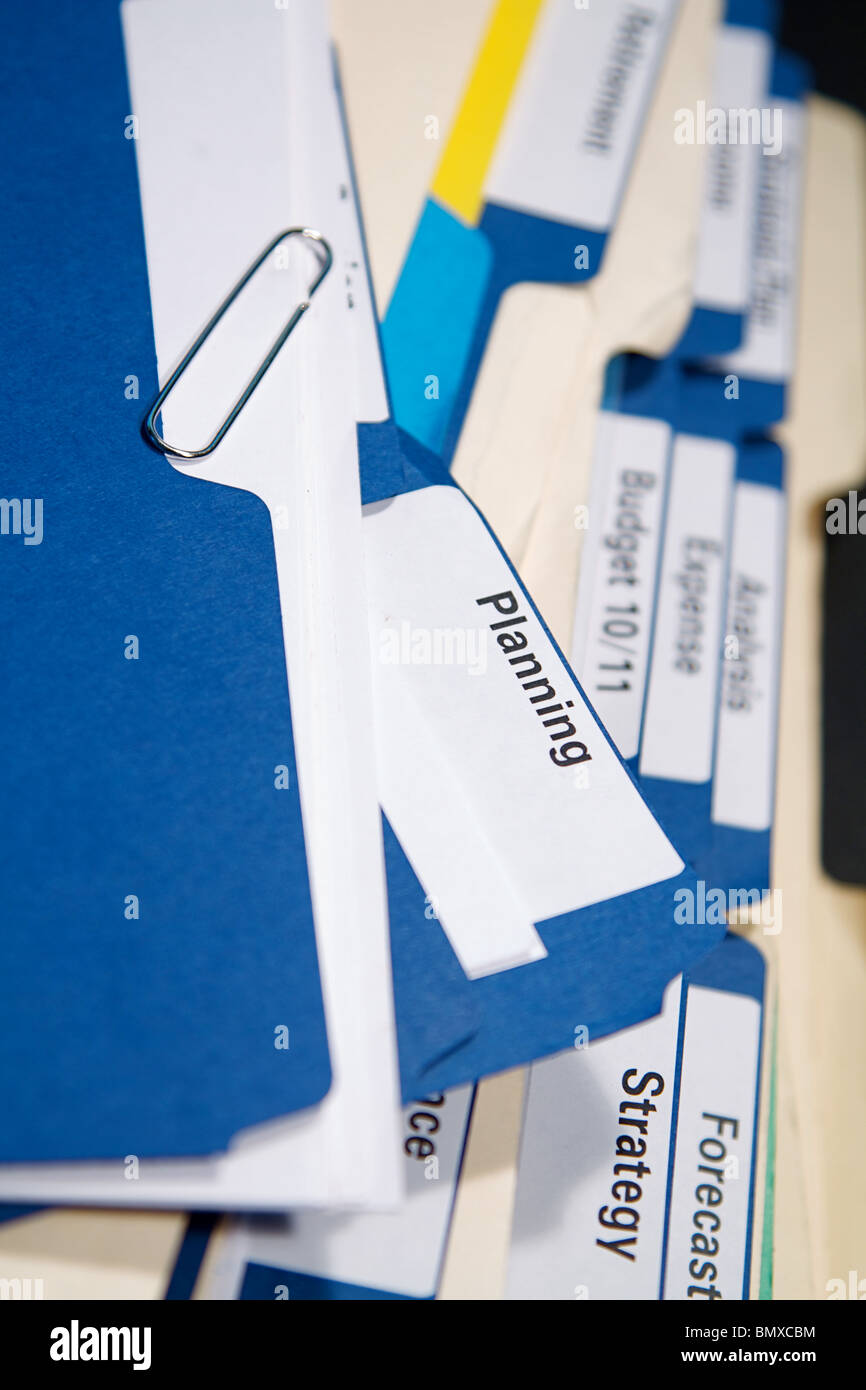 Filing cabinet full of business folders and documents Stock Photo - Alamy