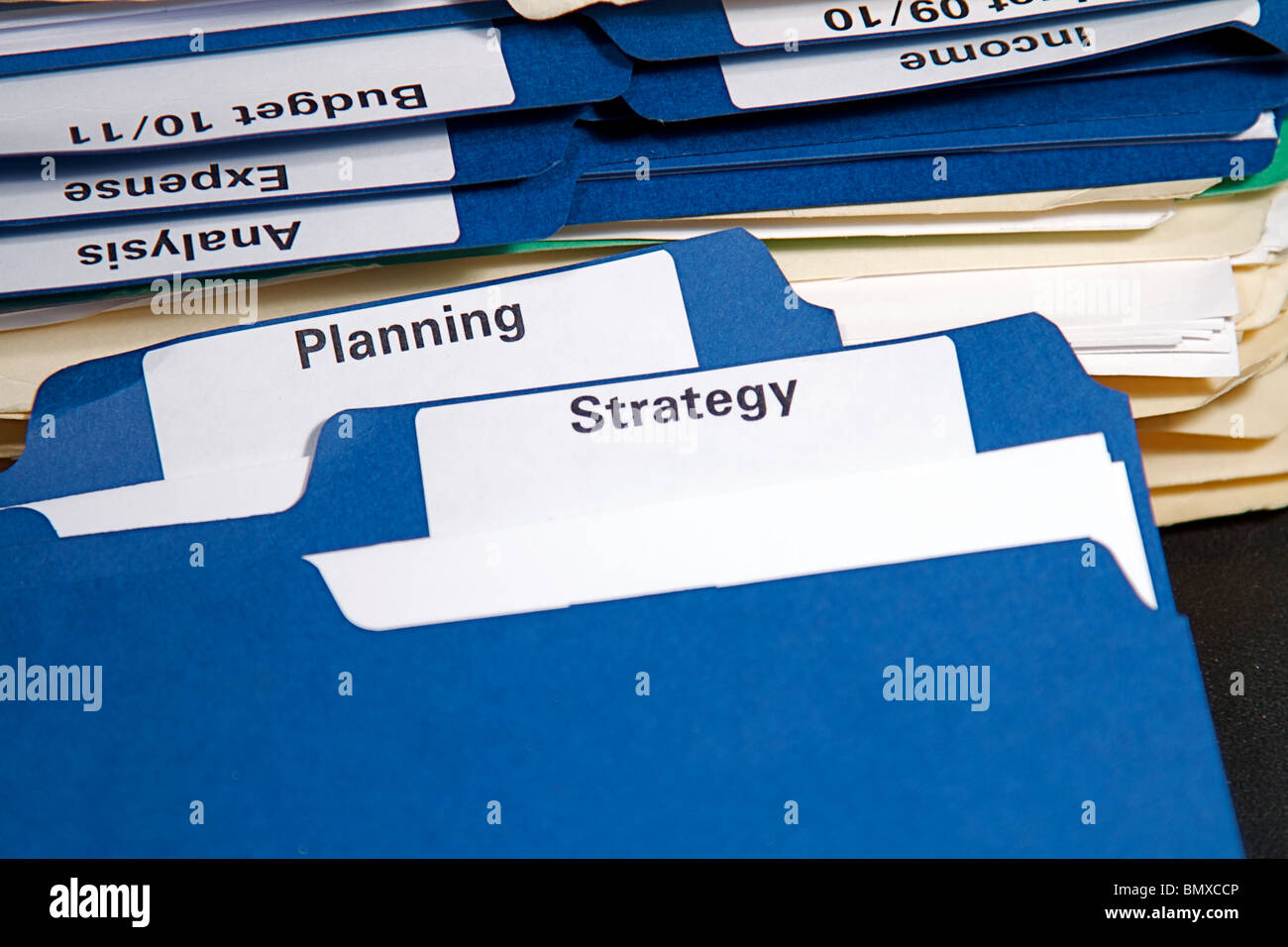 Filing cabinet full of business folders and documents Stock Photo - Alamy