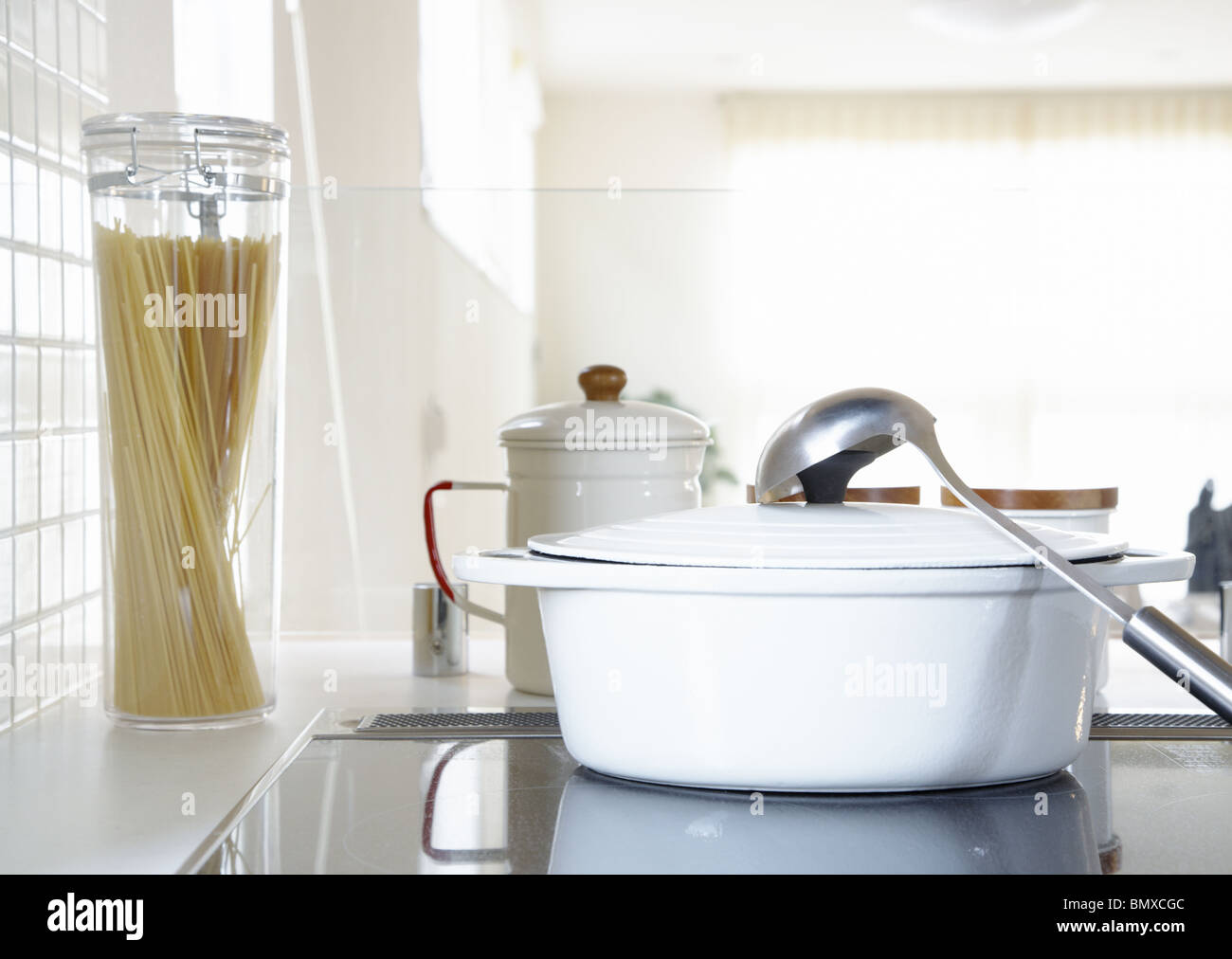 Pan and ladle Stock Photo - Alamy
