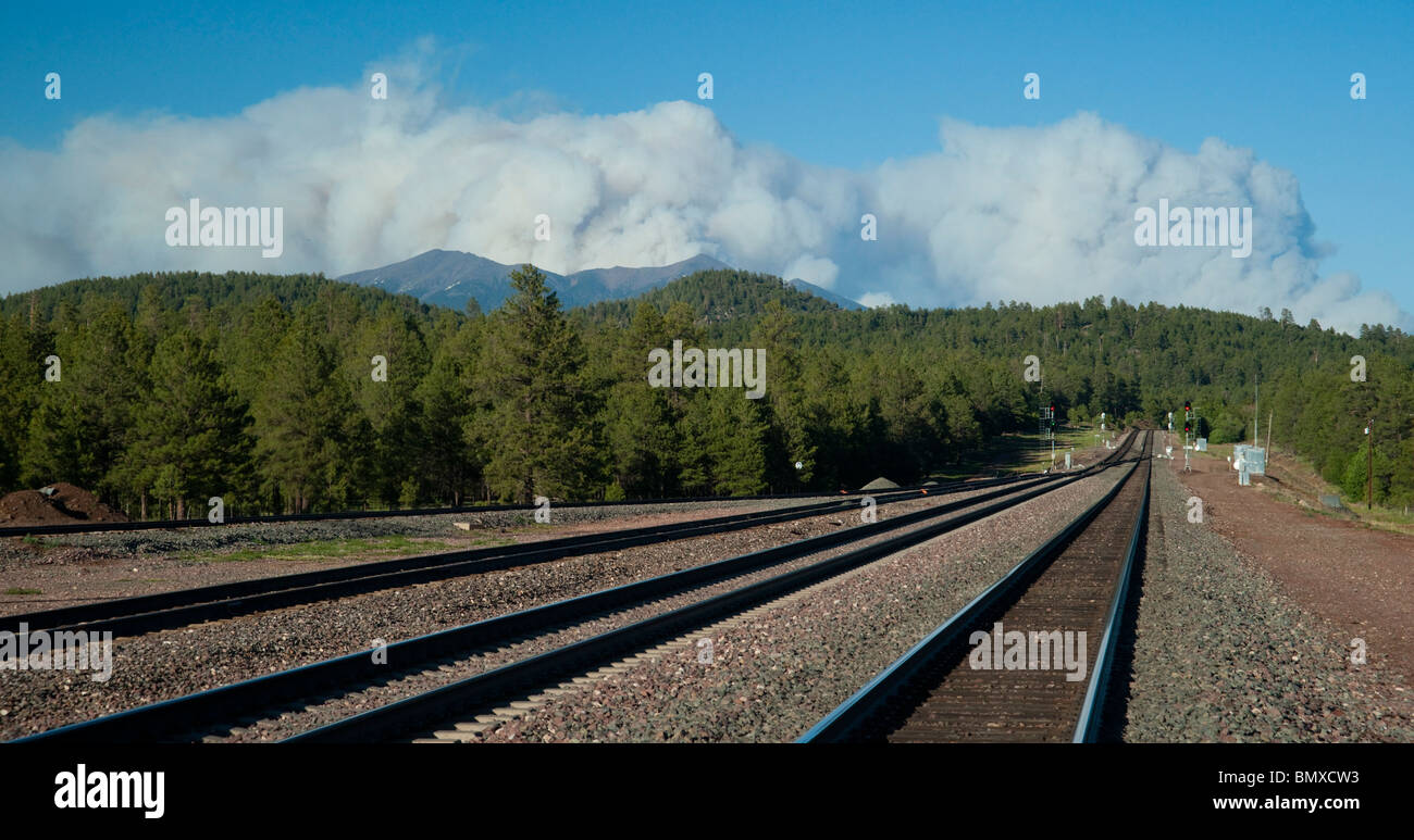 Clouds from the Schultz forest fire envelope Flagstaff Arizona as three ...