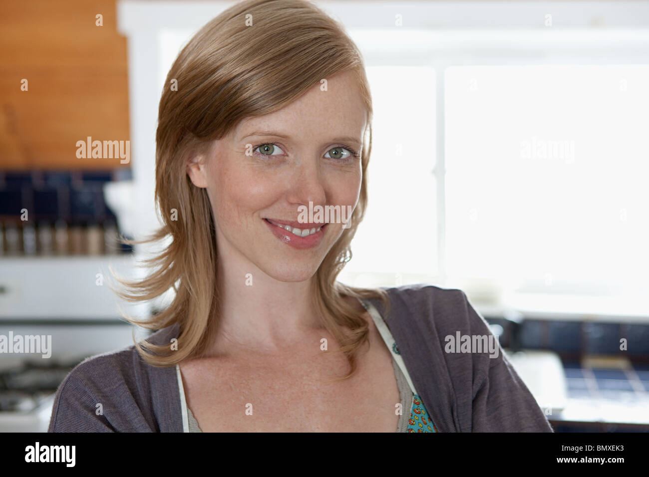 Portrait of a woman at home Stock Photo - Alamy