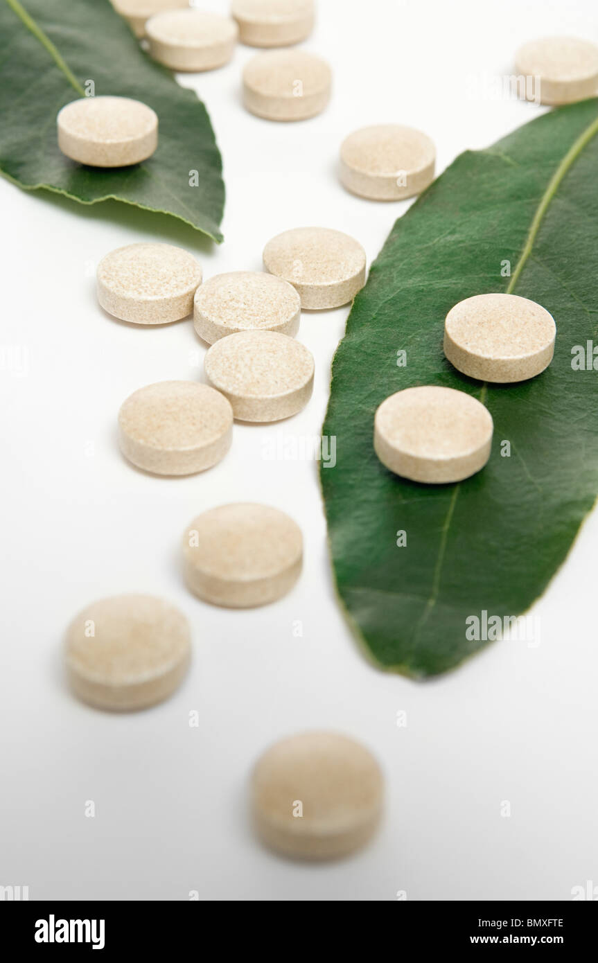 Bay leaves and tablets Stock Photo - Alamy