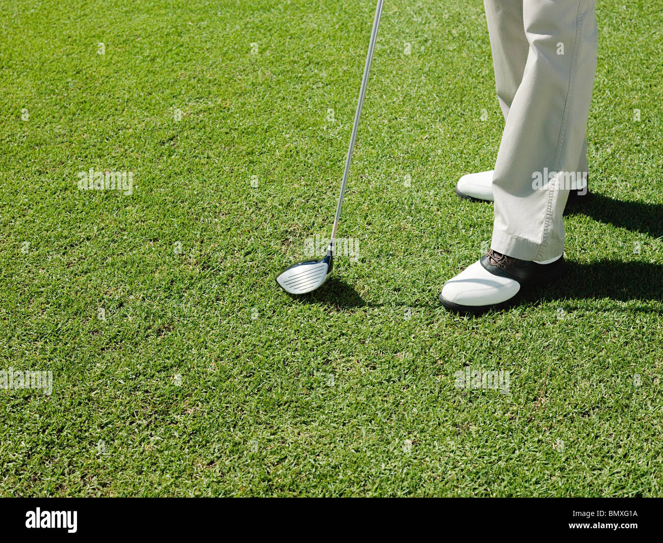 Golfer standing on one leg hi-res stock photography and images - Alamy