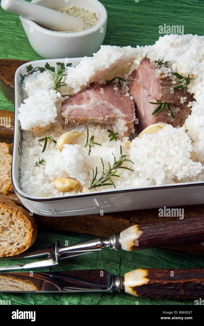 Roast pork sirloin in salt crust Stock Photo - Alamy