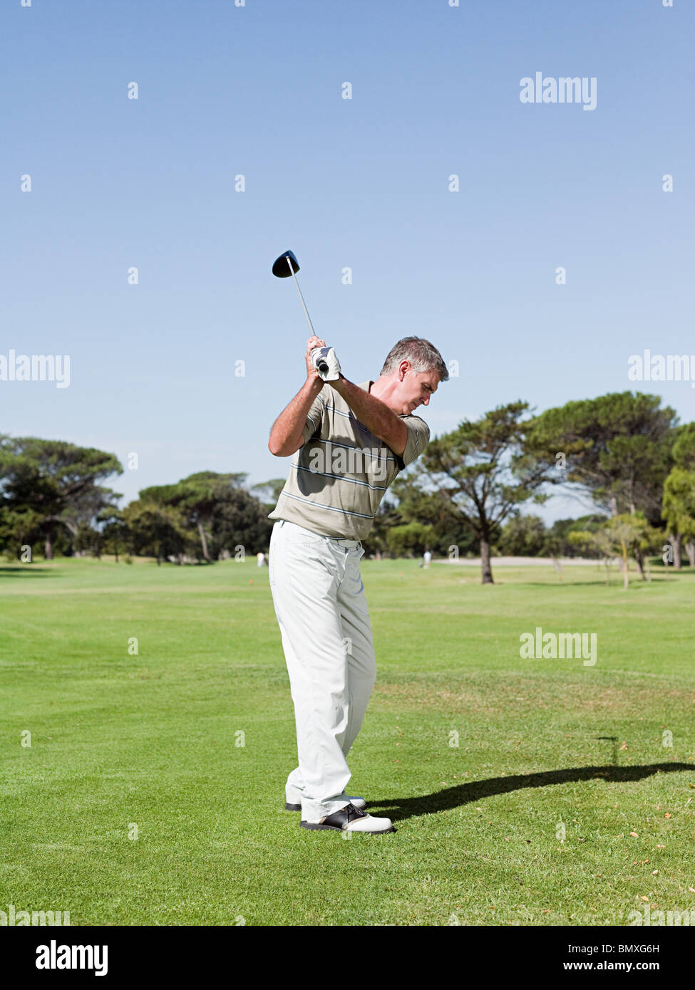Playing golf on course hi-res stock photography and images - Alamy