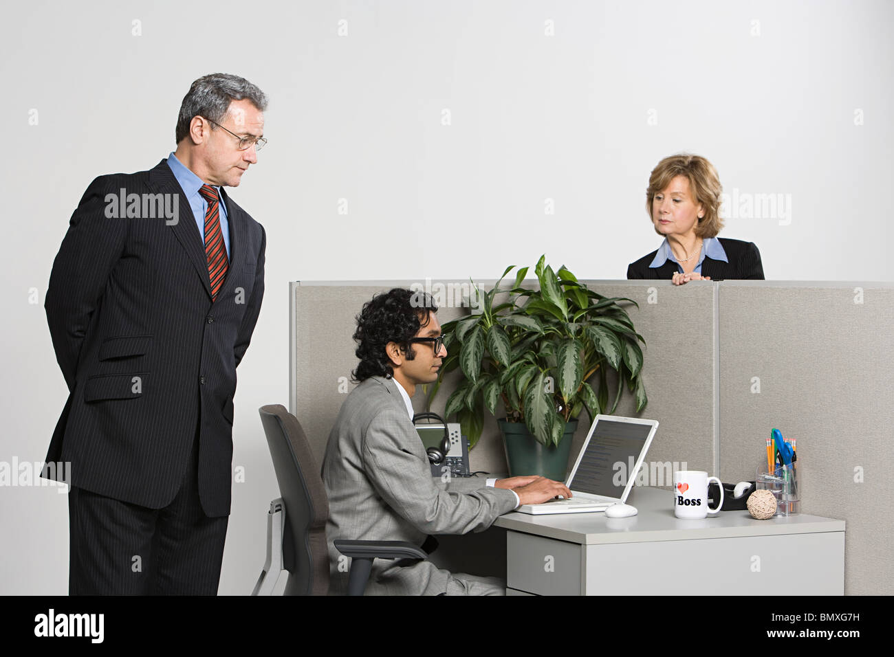 Woman peering over screen hi-res stock photography and images - Alamy