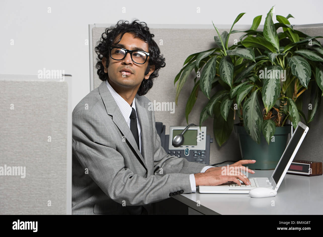 Guilty looking businessman Stock Photo - Alamy