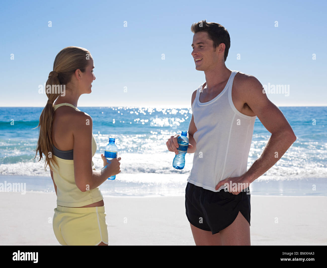 Young couple bottles water on hi-res stock photography and images - Alamy