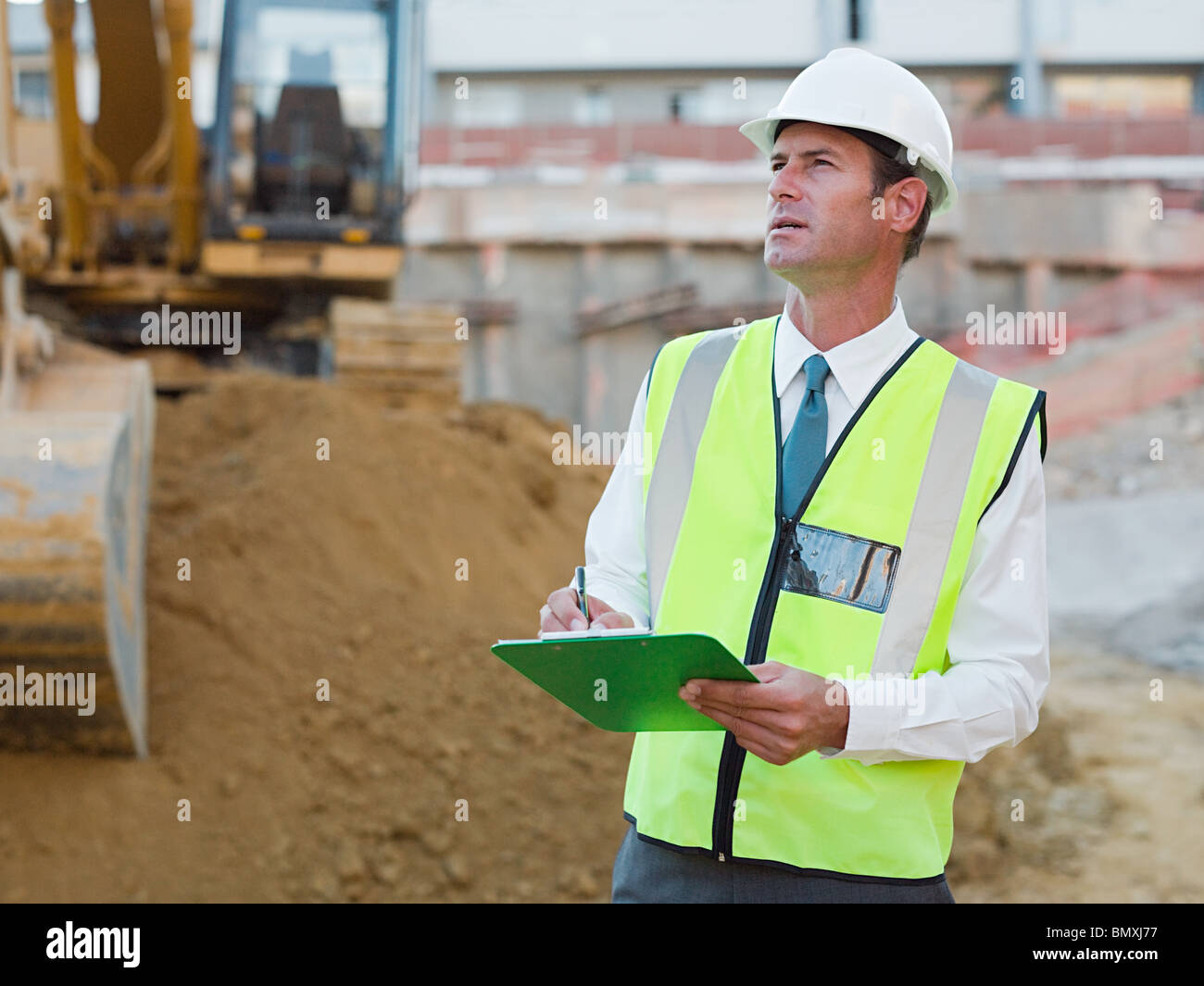 Mature man on construction site Stock Photo - Alamy