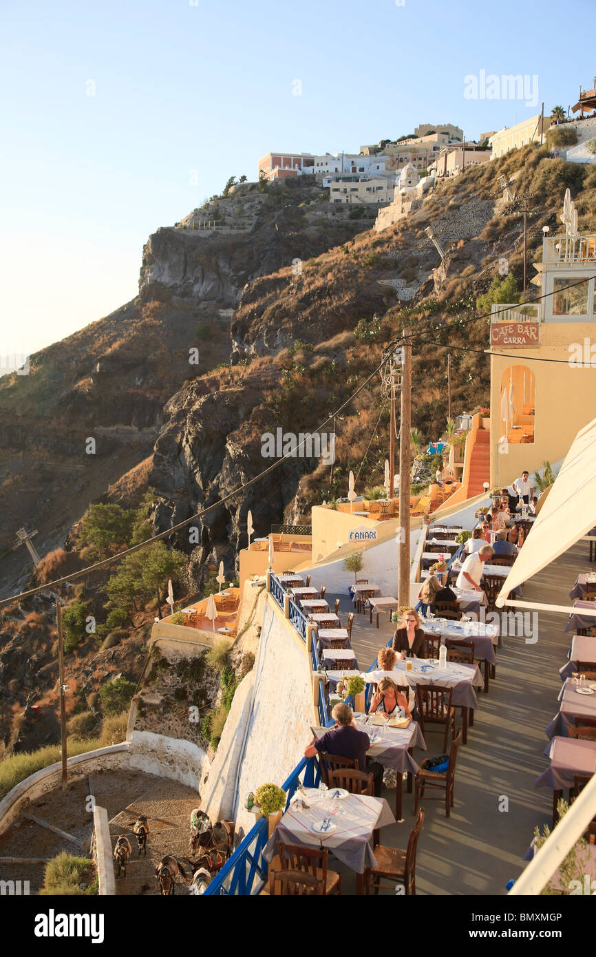 Greece, Cyclades, Santorini, Fira (Thira), Outdoor Cafe and Caldera ...