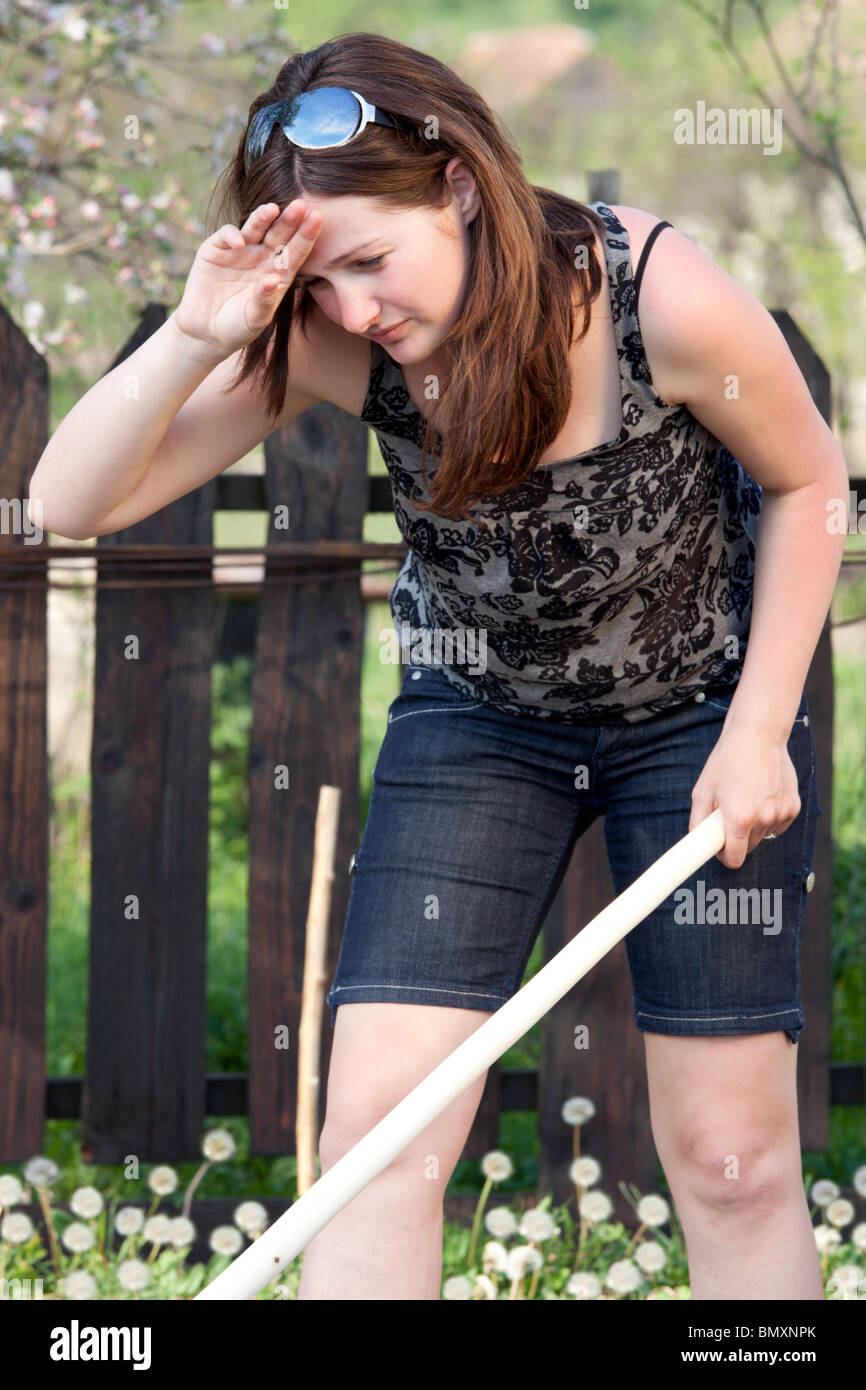 Woman digging hoe field hi-res stock photography and images - Alamy