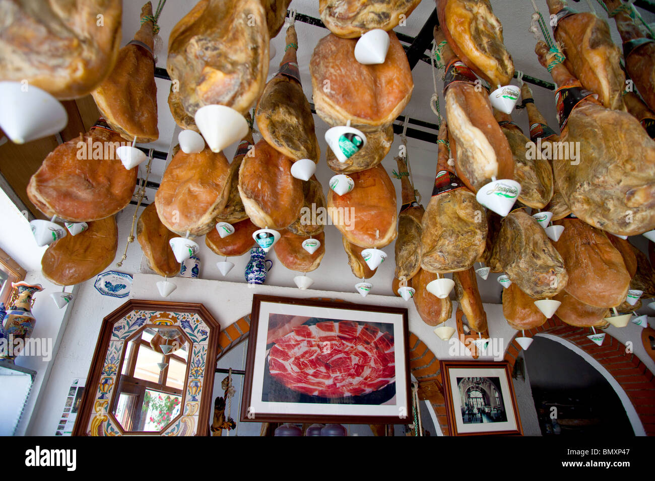 Traditional Ham leg hanging in souvenir shop ,Travelez Las Alpujarras ...