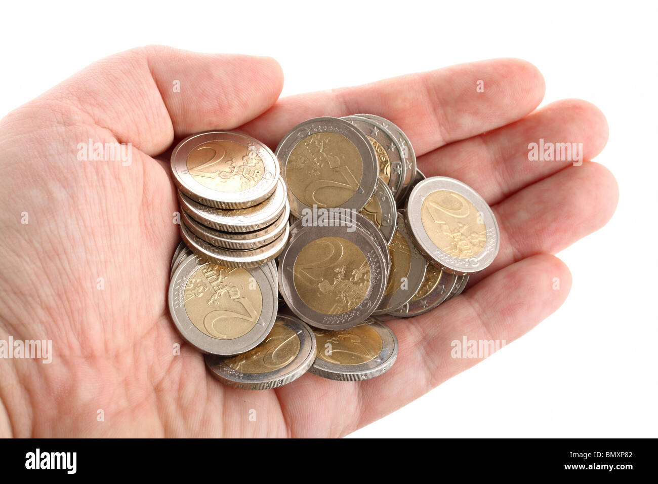Open hand showing several euro coins isolated on white Stock Photo - Alamy
