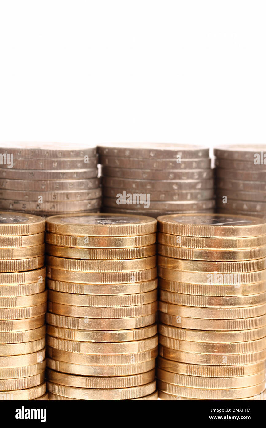 Coins organized in columns and rows isolated on white background Stock ...