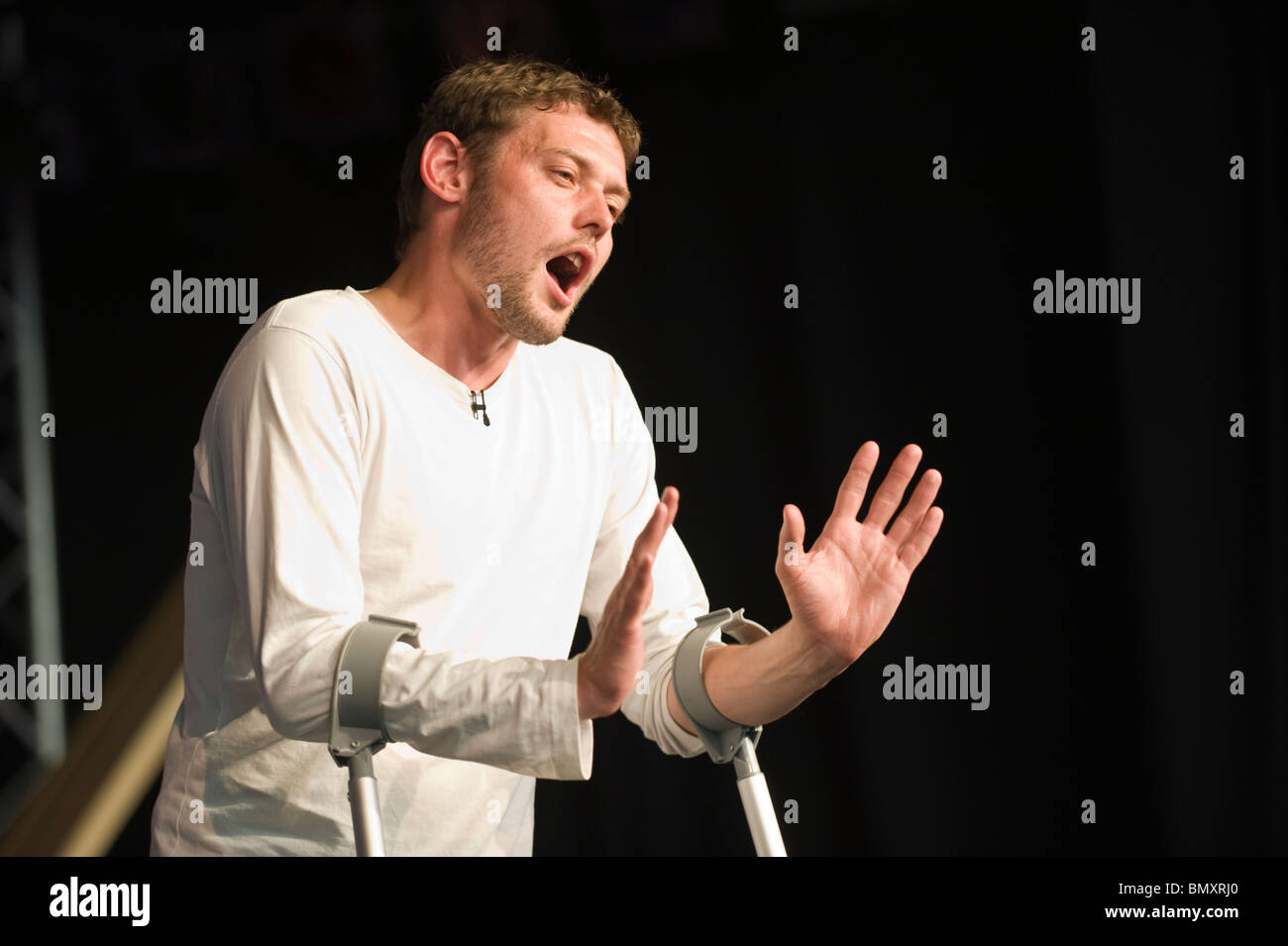 Children's comedian James Campbell performing on crutches to a family ...
