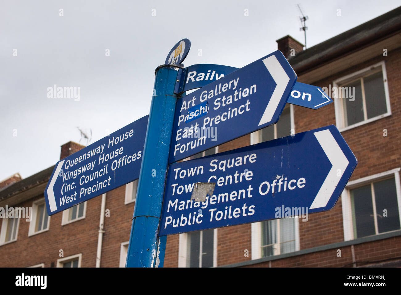 Direction signs and Retail shops in Britains first pedestrian town ...