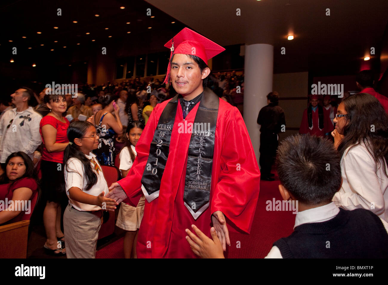 Hispanic boy graduates from KIPP Academy, a nationally-recognized ...