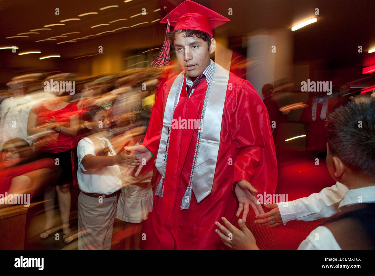 Hispanic boy graduates from KIPP Academy, a nationally-recognized ...