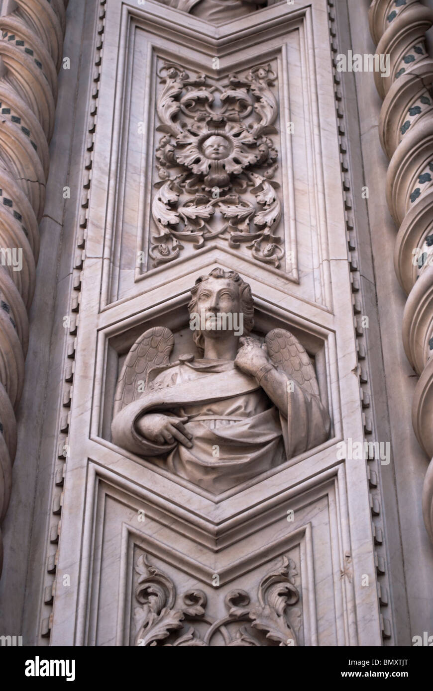 Detail of facade of Duomo, Florence: relief of angel Stock Photo - Alamy