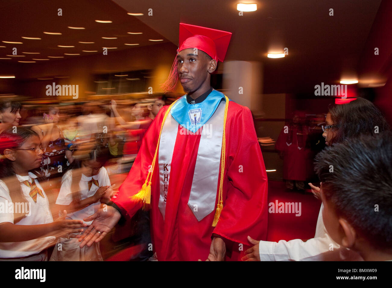 African American boy graduates from KIPP Academy, a nationally ...