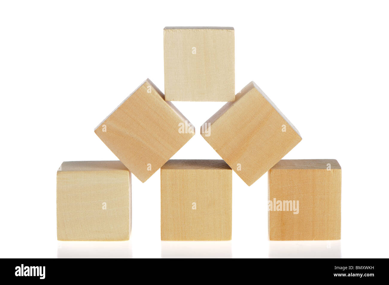 construction from wooden cubes. It is isolated on a white background ...