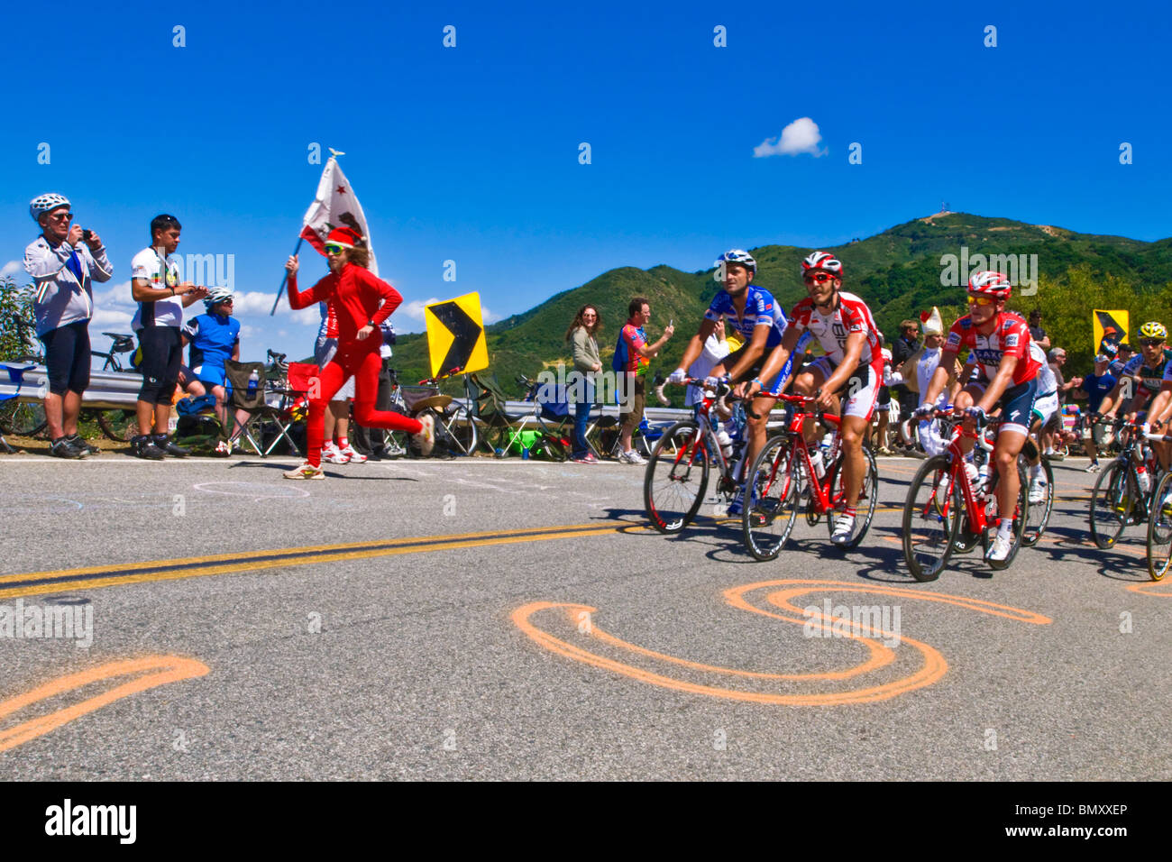 Professional cyclists and spectators at the Amgen Tour of California ...