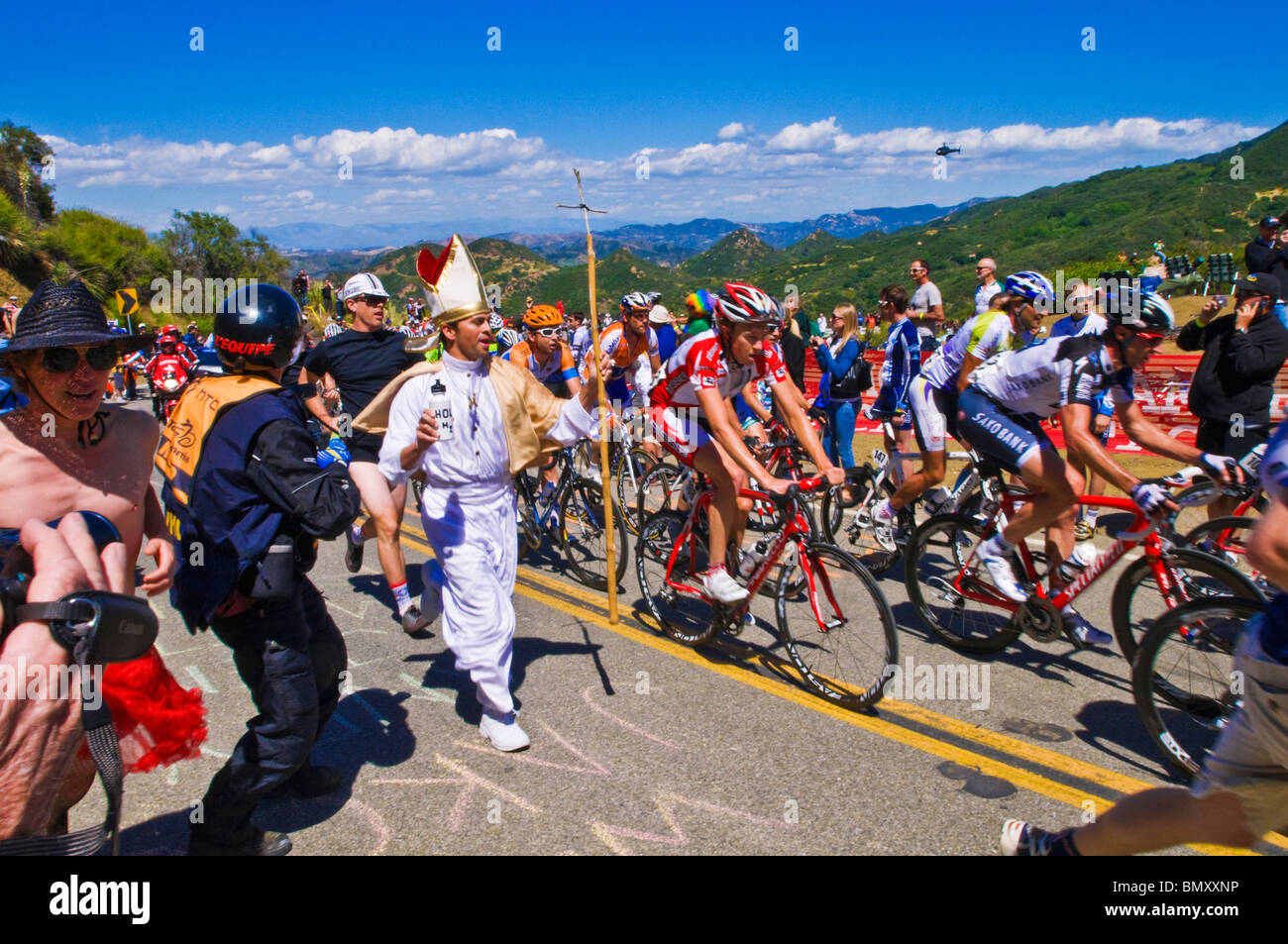 Professional cyclists and spectators at the Amgen Tour of California ...