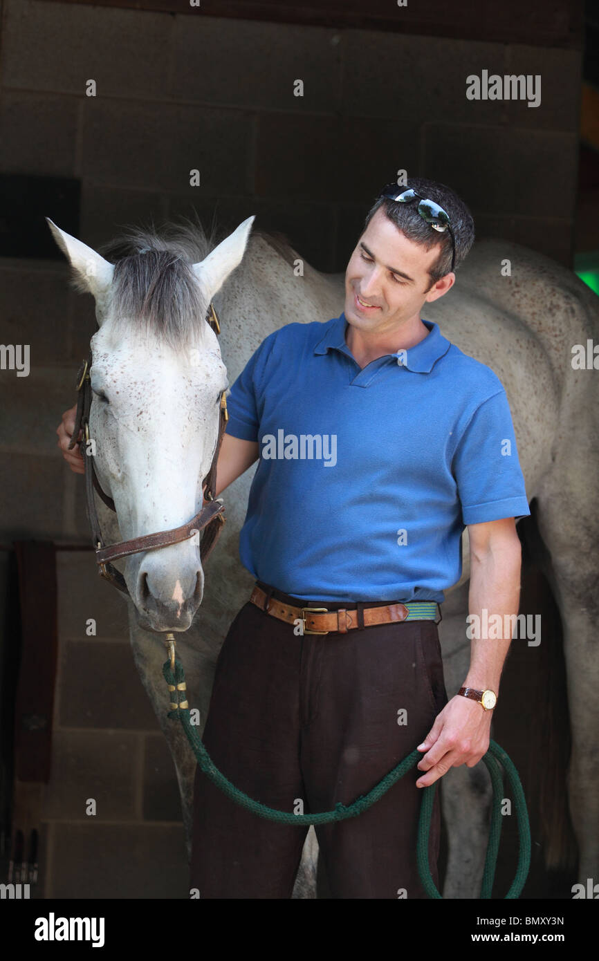 man and horse posing for portrait Stock Photo - Alamy