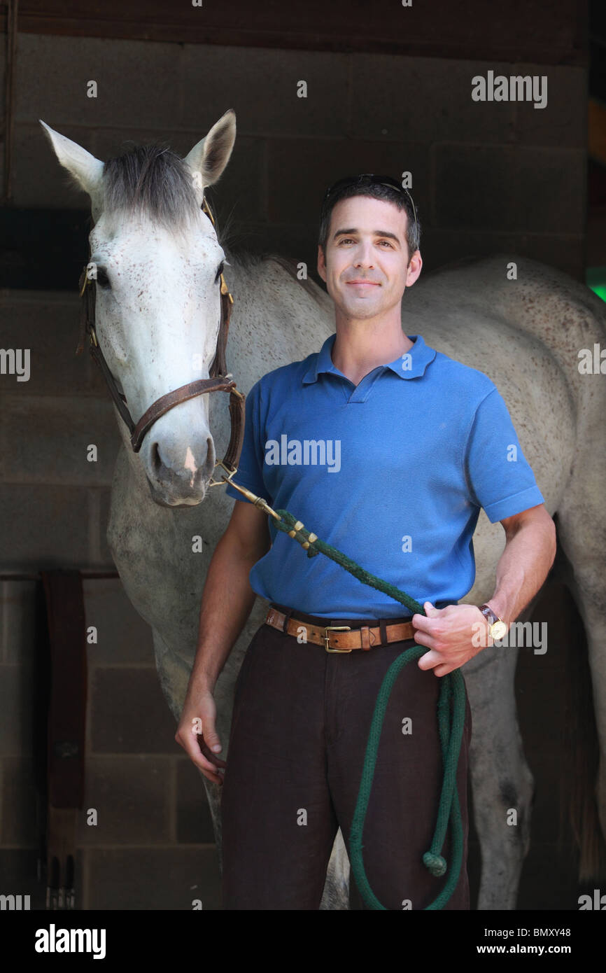 man and horse posing for portrait Stock Photo - Alamy