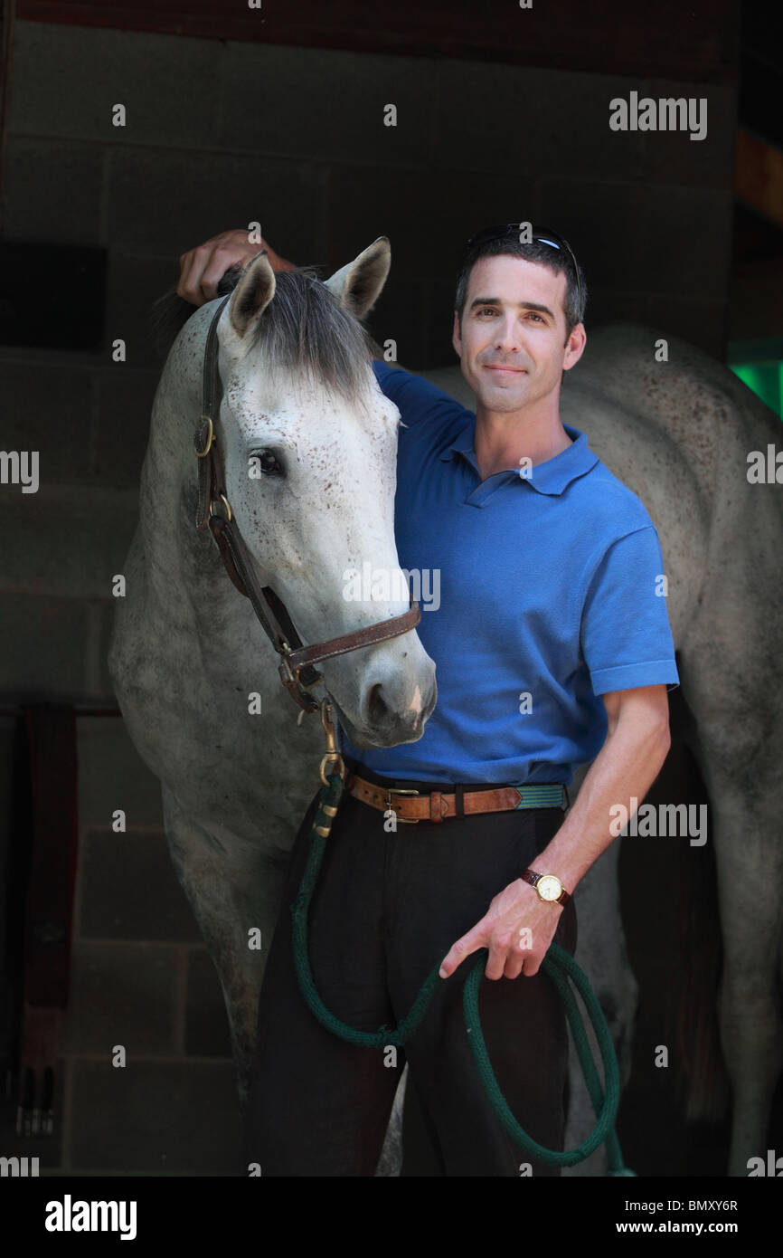 man and horse posing for portrait Stock Photo - Alamy