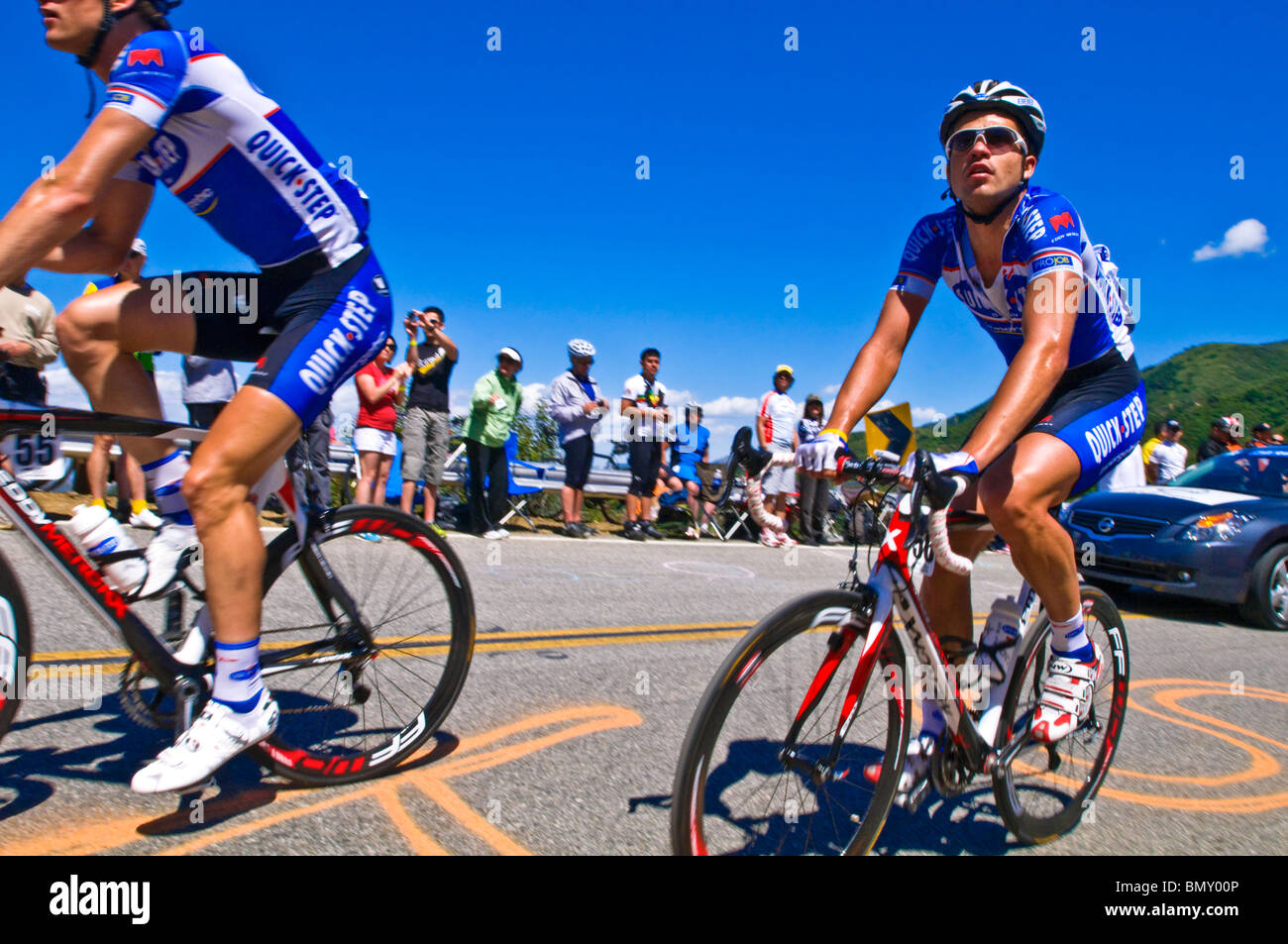 Professional cyclists and spectators at the Amgen Tour of California ...