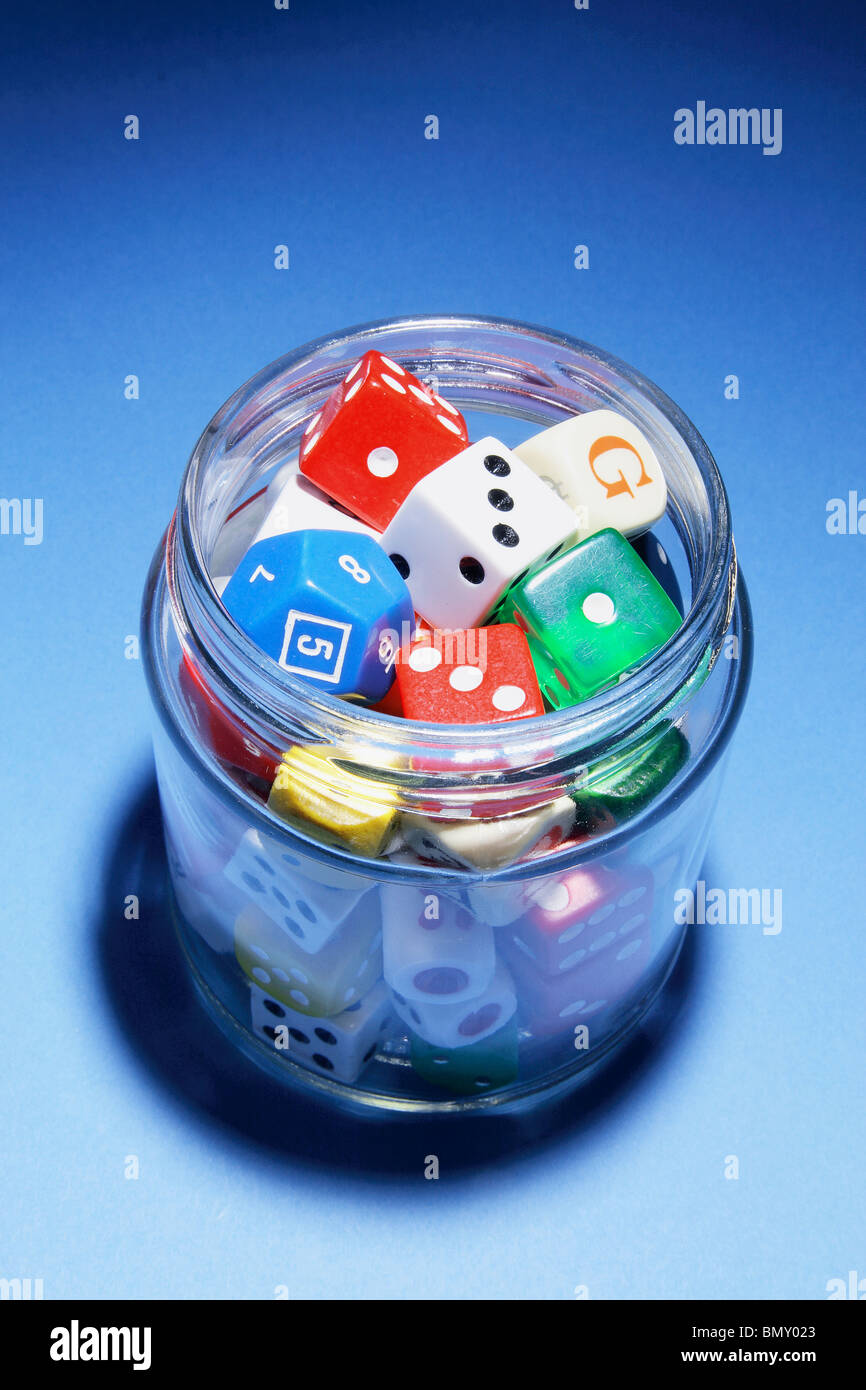 Dice in Glass Jar Stock Photo - Alamy