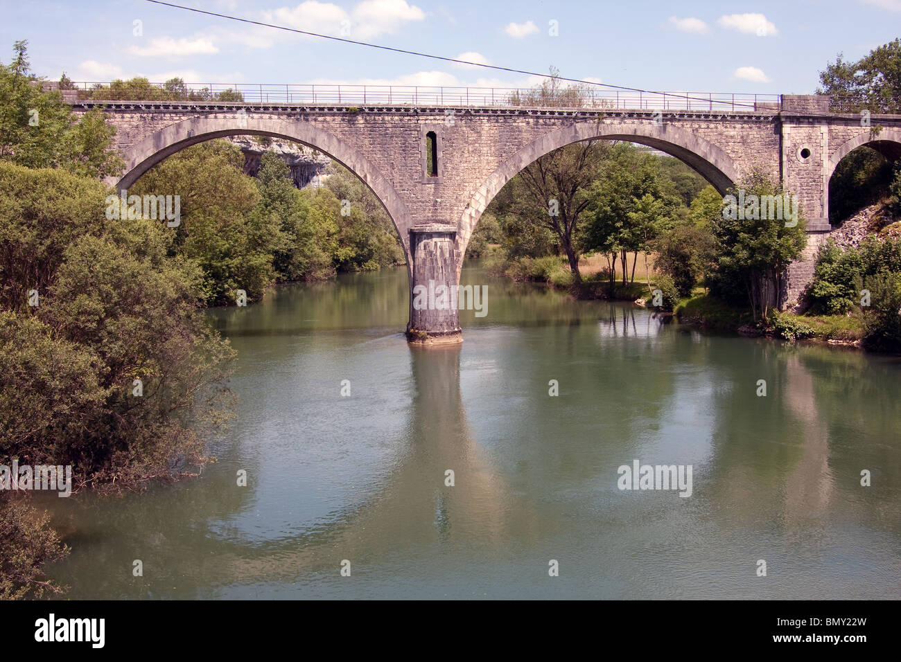 old road bridge river doubs trees arch village Stock Photo - Alamy