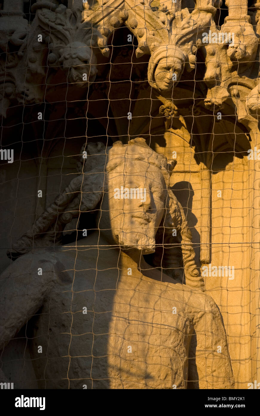 carved statue on exeter cathedral Stock Photo - Alamy