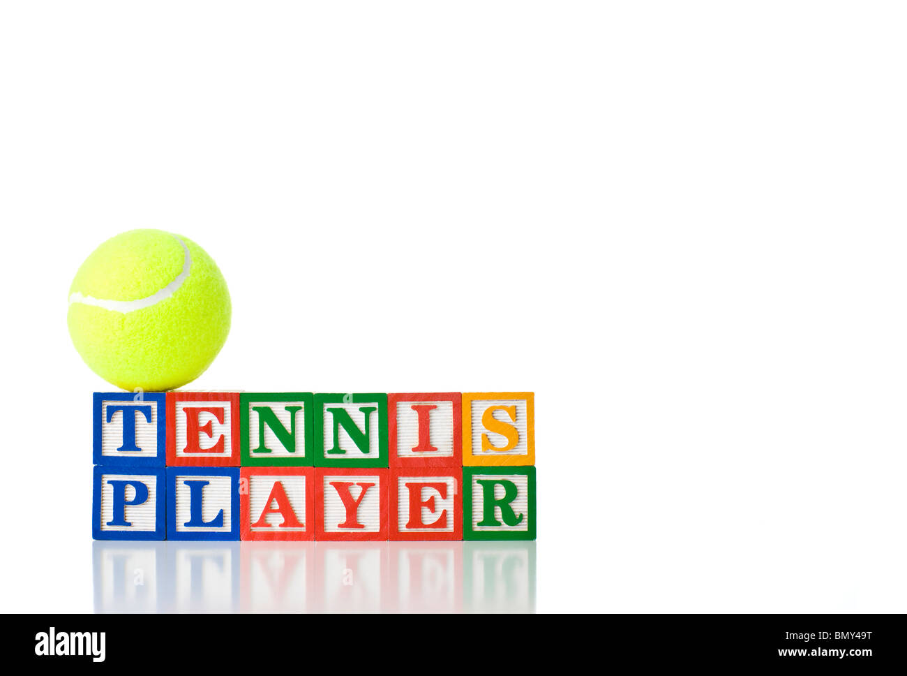 Colorful children's blocks spelling TENNIS PLAYER with tennis ball ...