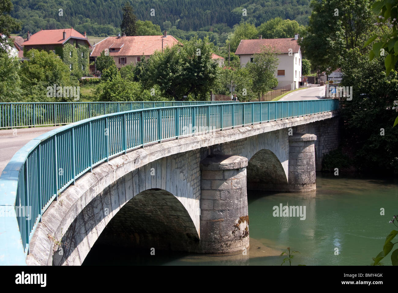 old road bridge river doubs trees arch village Stock Photo - Alamy