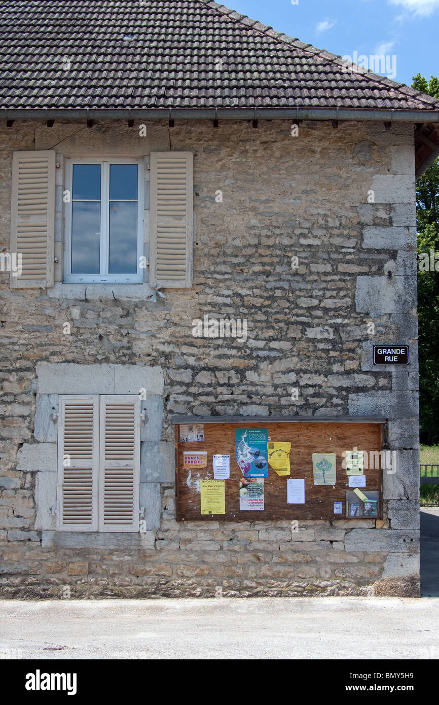 house louvre windows notice board stone wall Stock Photo - Alamy