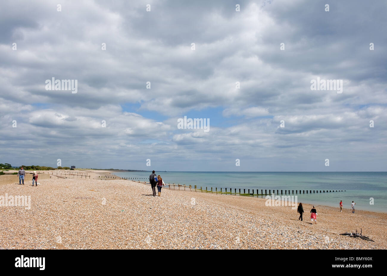 People walking on Climping Beach in West Sussex Stock Photo - Alamy