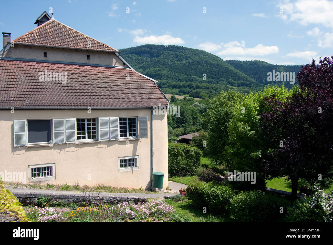 modern house village countryside forest mountains Stock Photo - Alamy